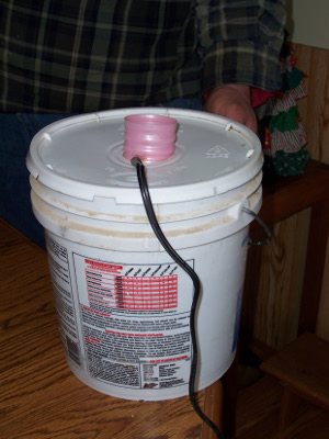 Heated bucket waterer with aquarium heater | Avian Aqua Miser